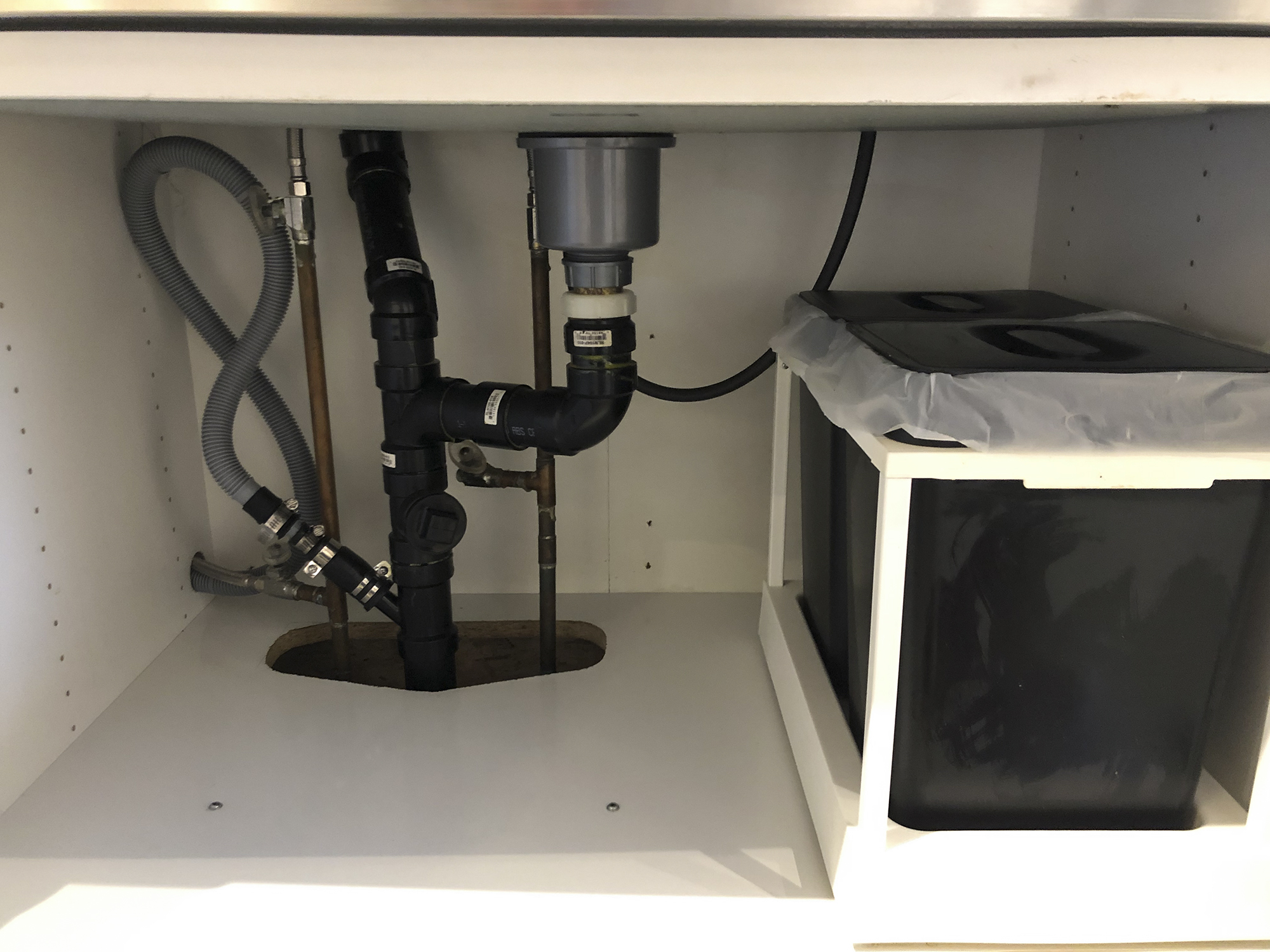 How to Organize Under the Kitchen Sink